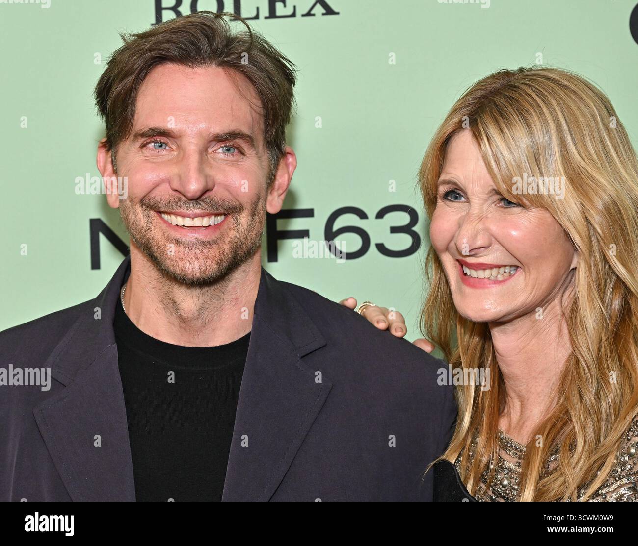 Bradley Cooper, left, and Laura Dern attend the premiere of "Is This ...