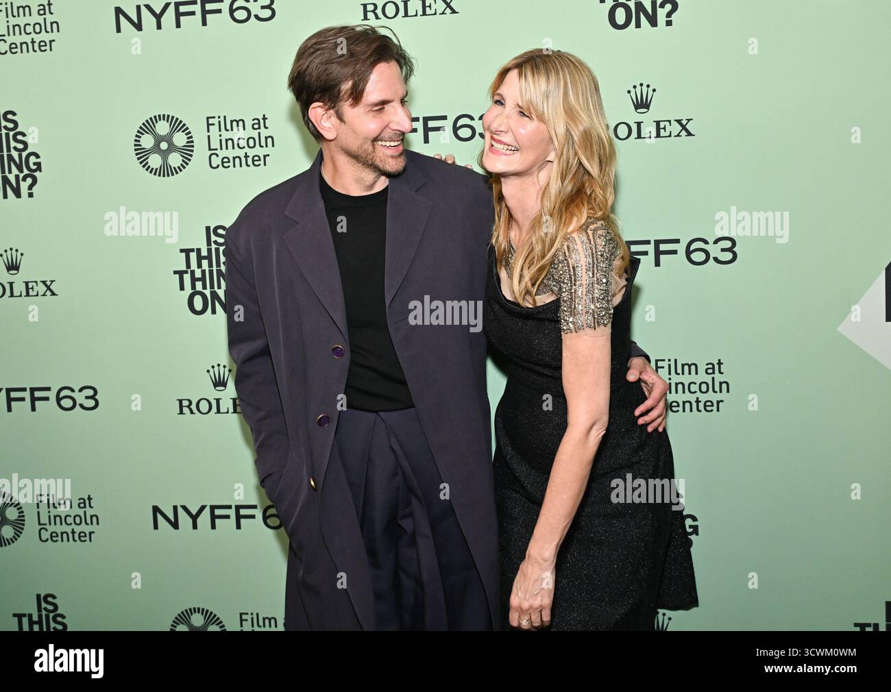 Bradley Cooper, left, and Laura Dern attend the premiere of "Is This ...
