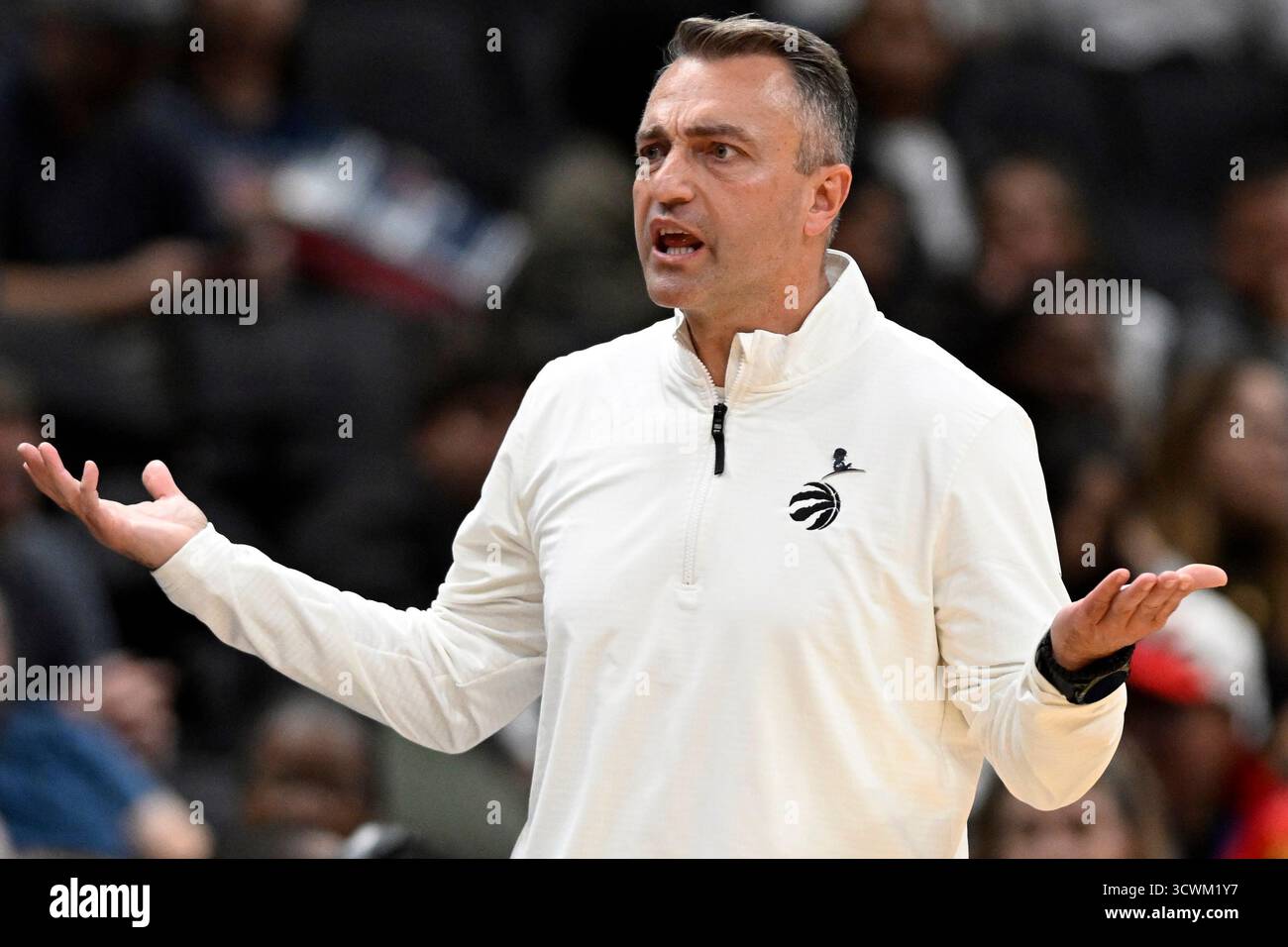 Toronto Raptors head coach Darko Rajakovic questions a referee's call ...