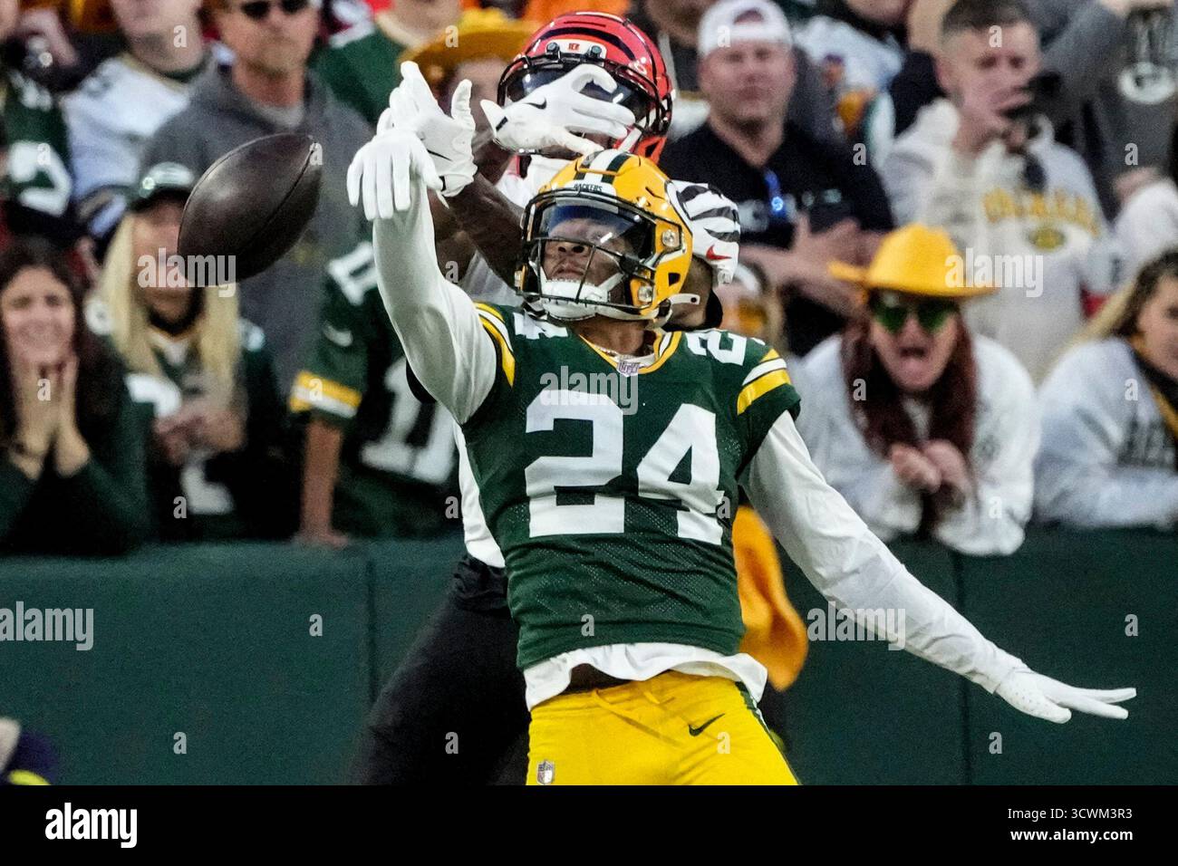 Green Bay Packers cornerback Carrington Valentine (24) breaks up a pass ...