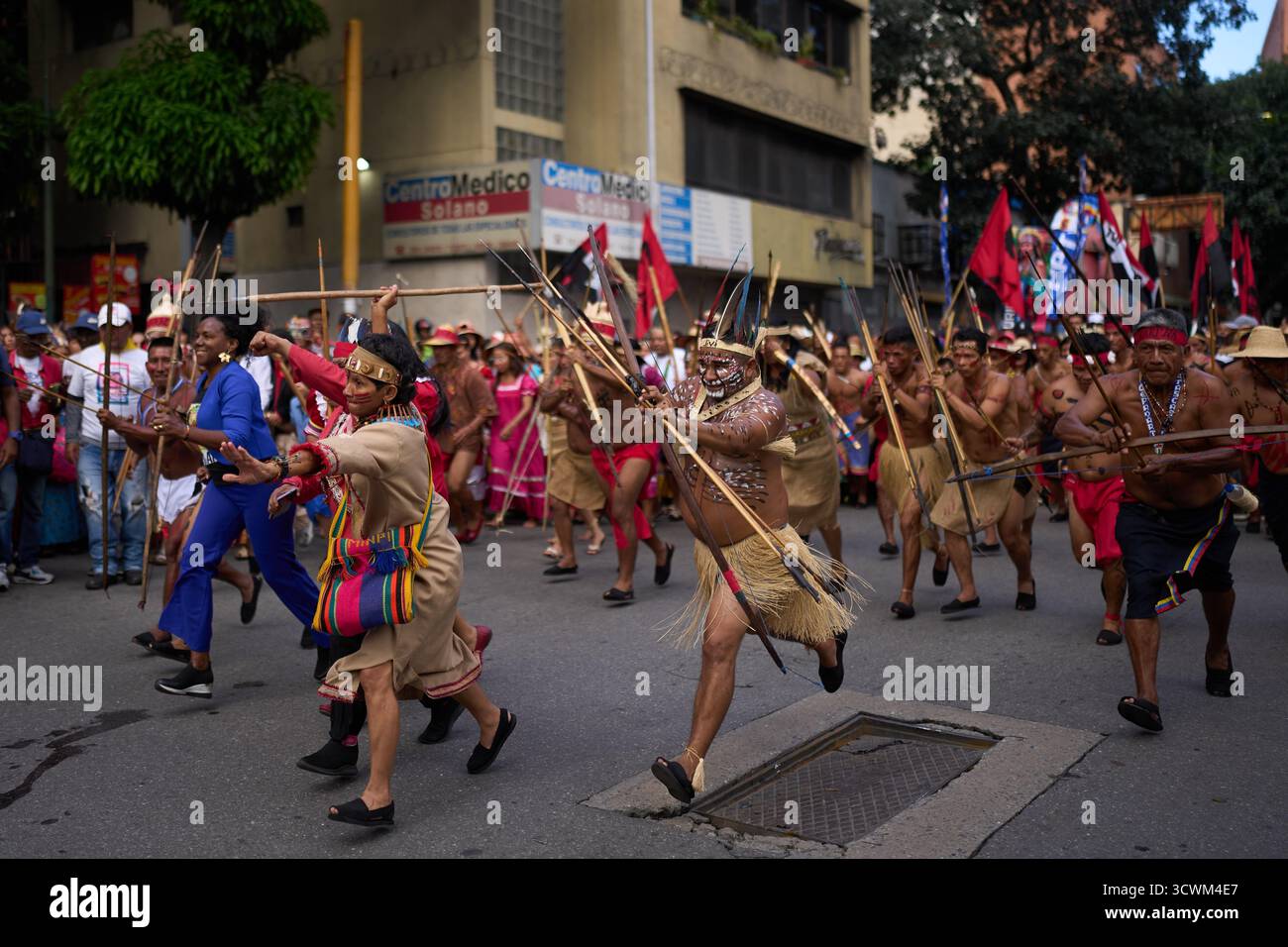 People partake in an event on Indigenous Day in Caracas, Venezuela ...