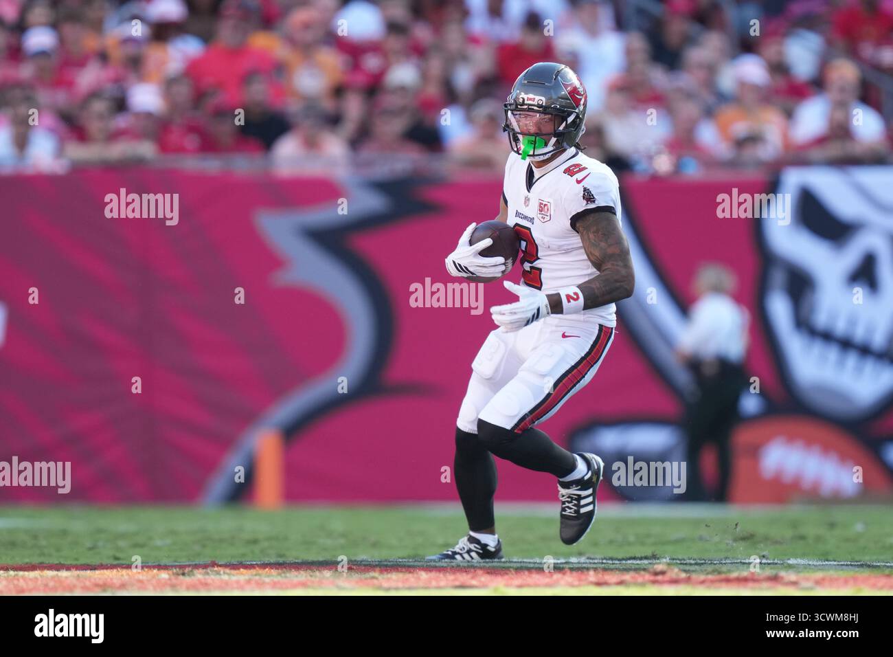 Tampa Bay Buccaneers wide receiver Emeka Egbuka (2) runs after a catch ...