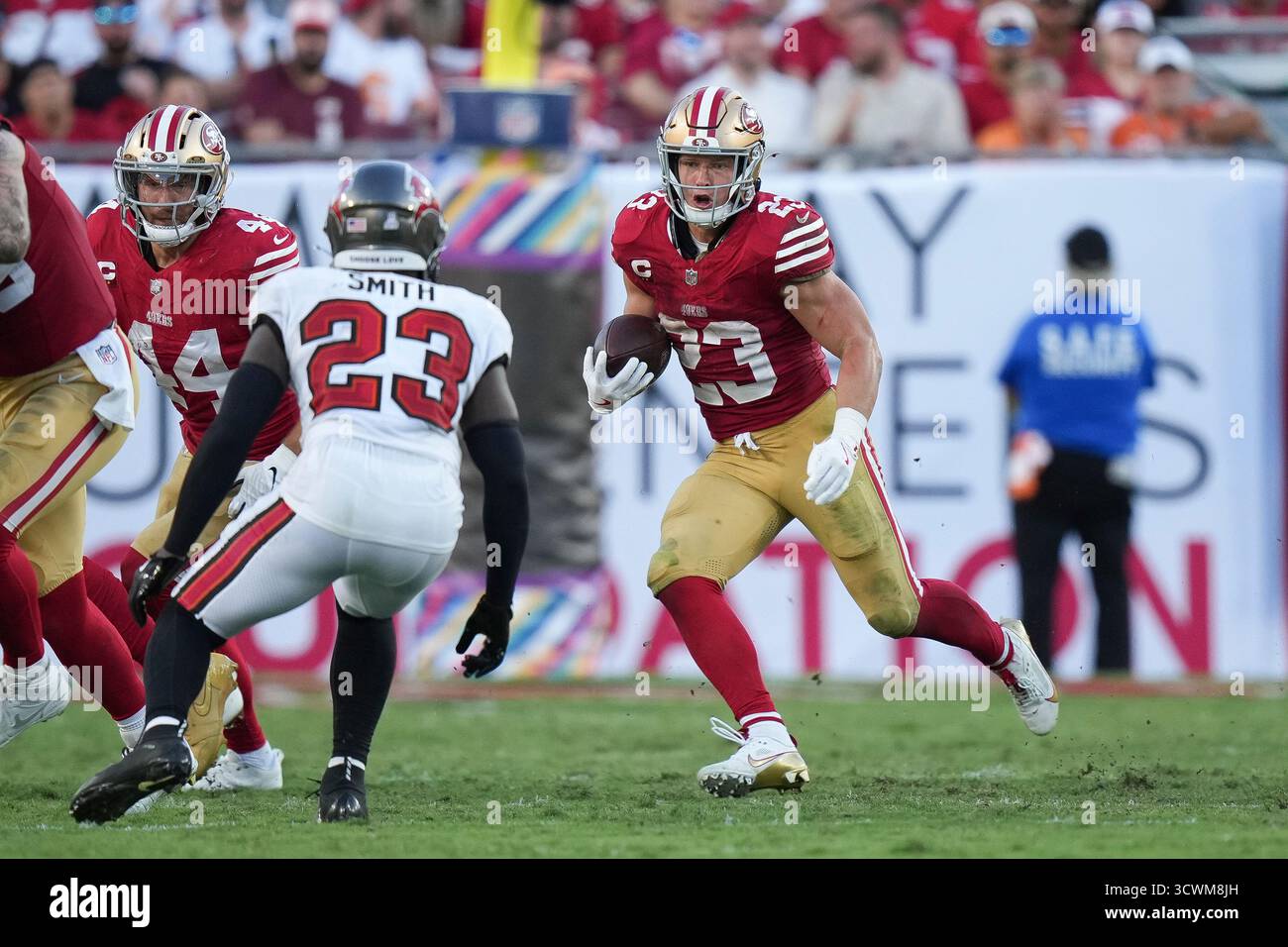 San Francisco 49ers running back Christian McCaffrey (23) rushes with ...
