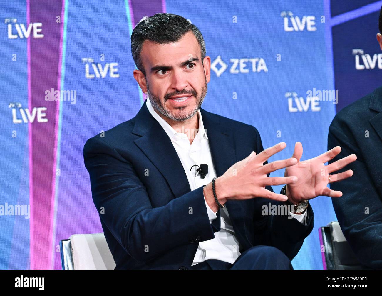 ZoomInfo founder and CEO Henry Schuck speaks at the Zeta Live ...