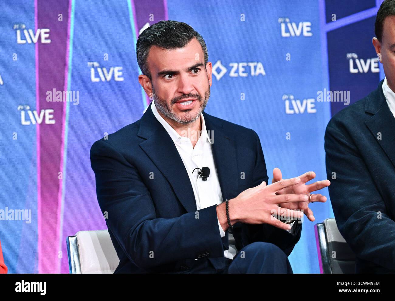 ZoomInfo founder and CEO Henry Schuck speaks at the Zeta Live ...