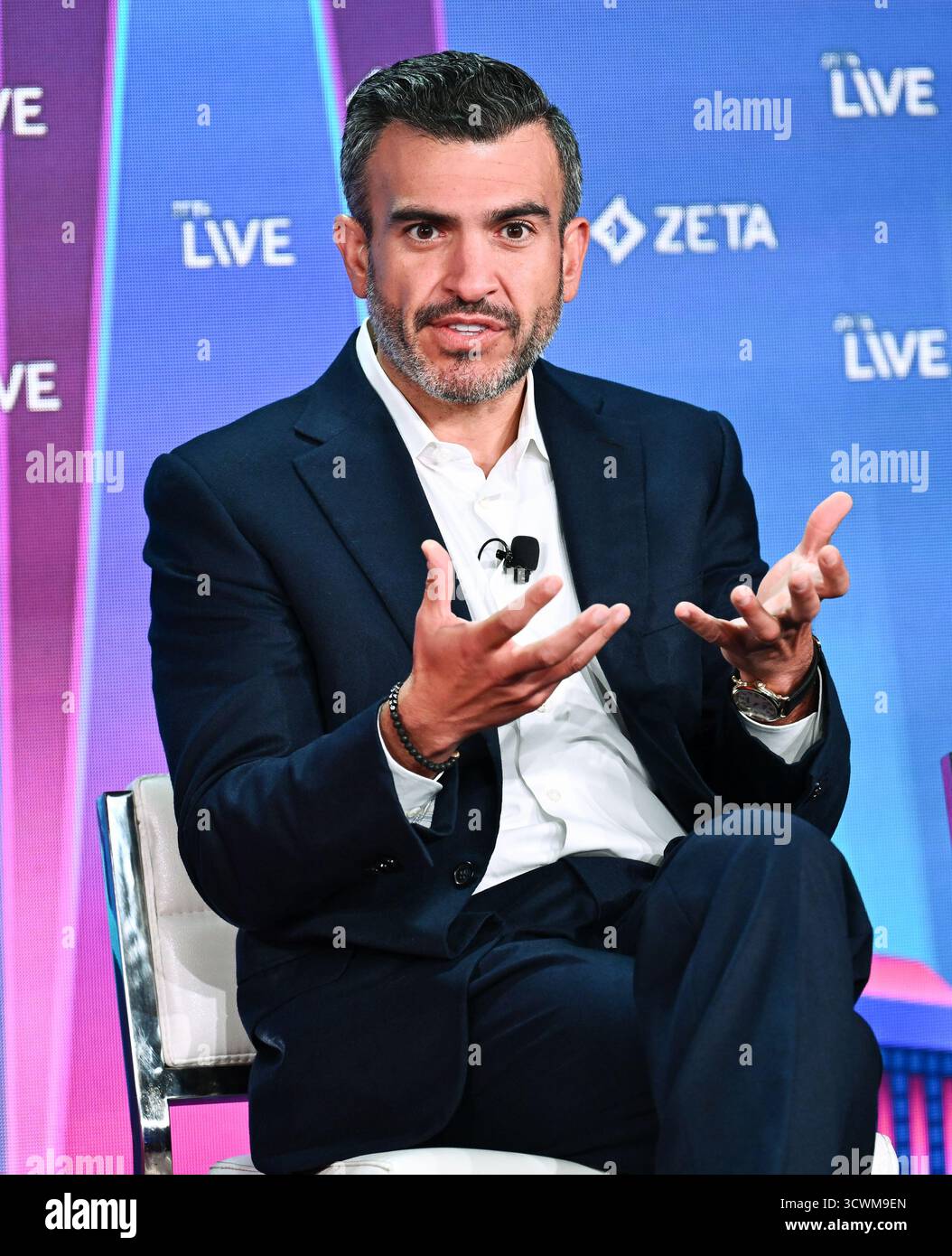 ZoomInfo founder and CEO Henry Schuck speaks at the Zeta Live ...