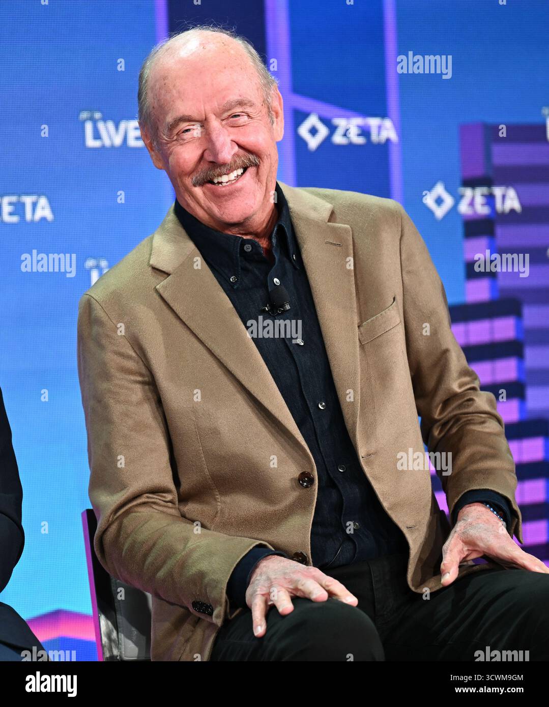 Stan Smith speaks at the Zeta Live conference at Center415 on Thursday ...
