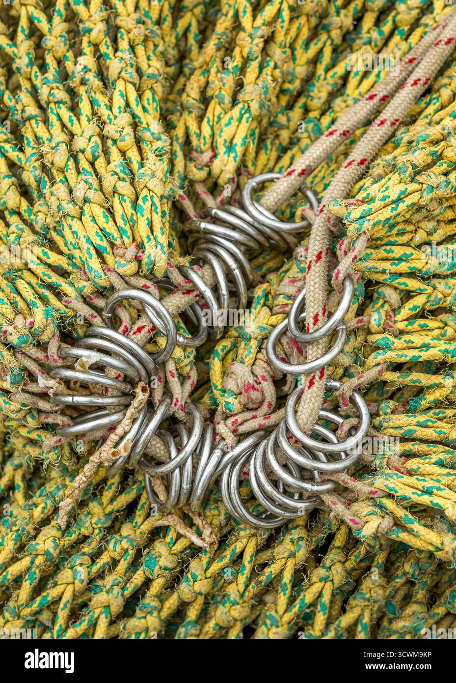 Close-up of a section of an ocean fish trawl net showing intertwined ...