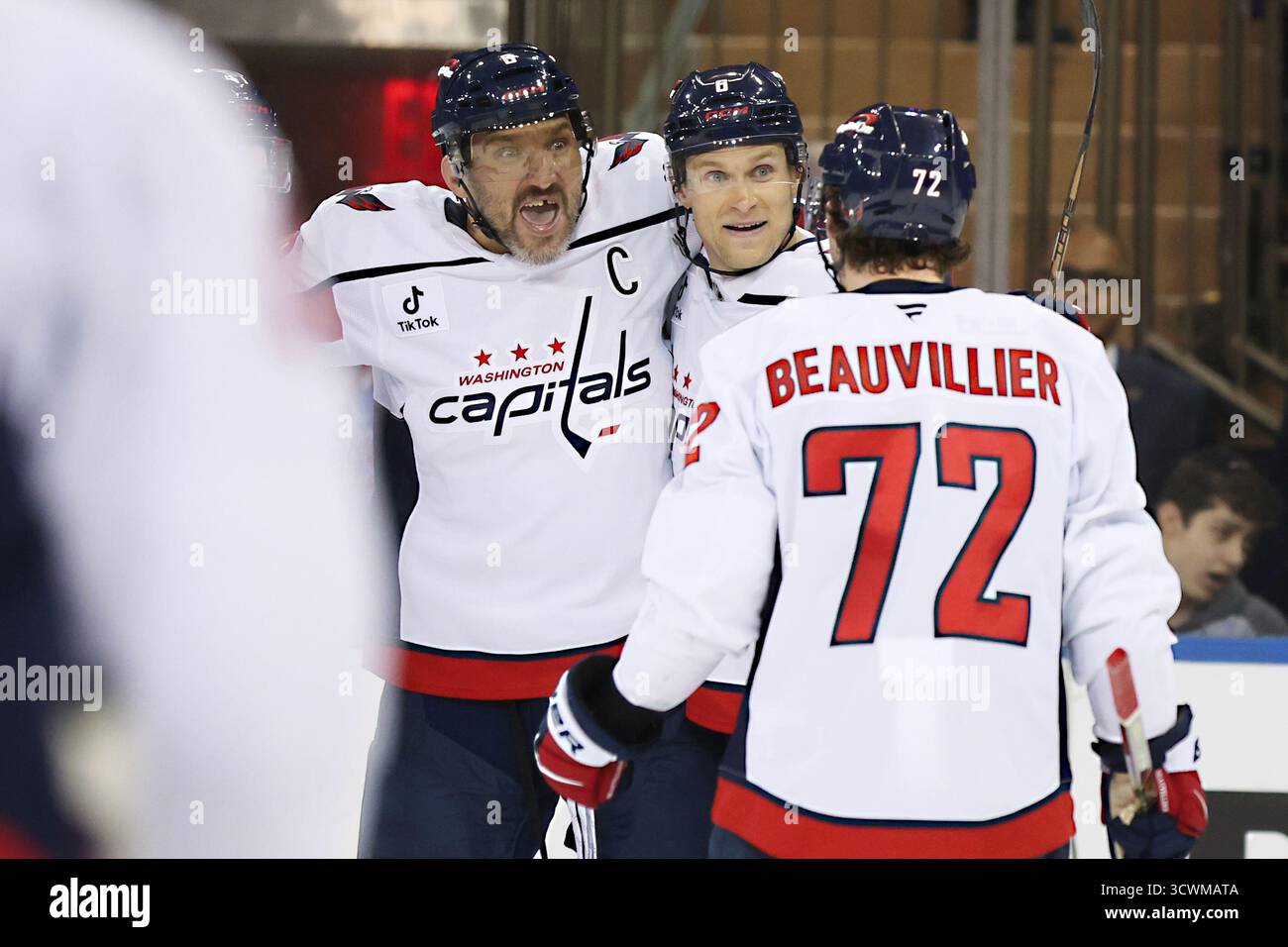 Washington Capitals' Alex Ovechkin, left, reacts after his assist led ...