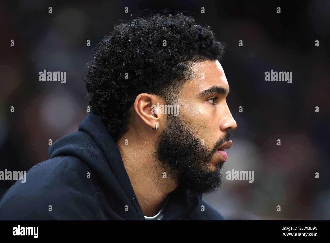 Boston Celtics' Jayson Tatum sits on the bench during the first half of ...