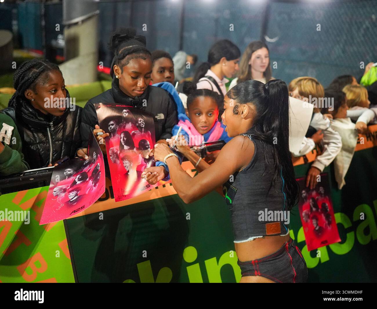 New York, New York, USA. 10th Oct, 2025. Alaysha Johnson signs ...