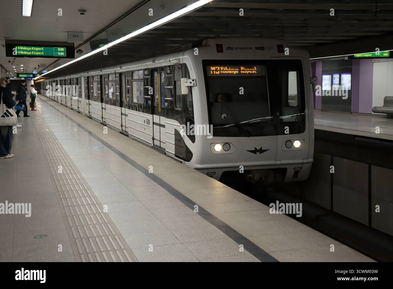 A Budapest M3 metro train arrives at Újpest-Városkapu station, a key ...