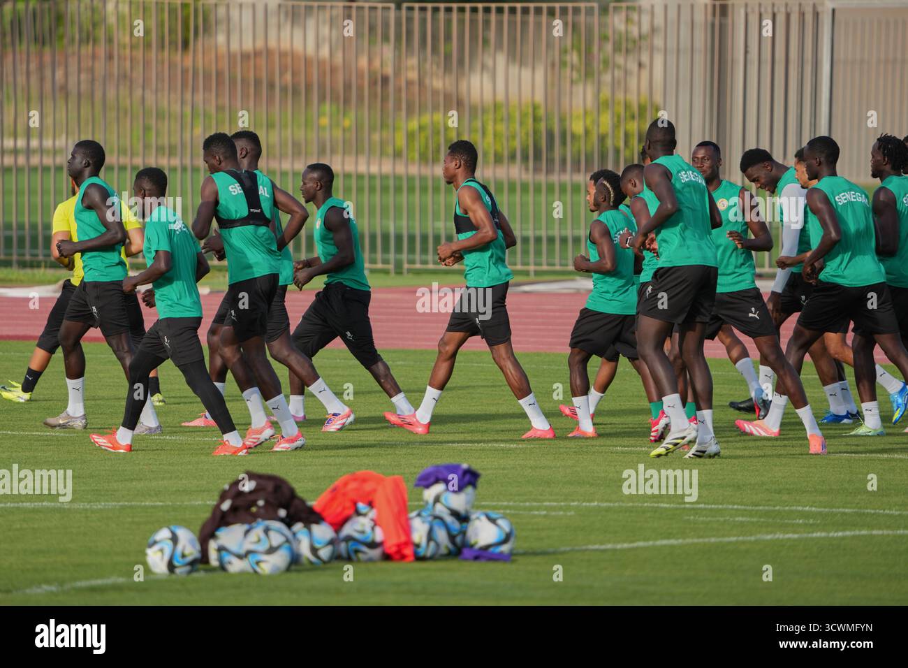 Senegal's players warm up during a training session ahead of their 2026 ...