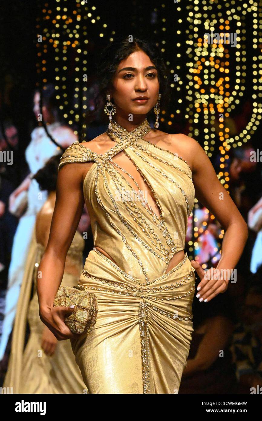 A model displays a creation by designer Tarun Tahiliani at the grand ...