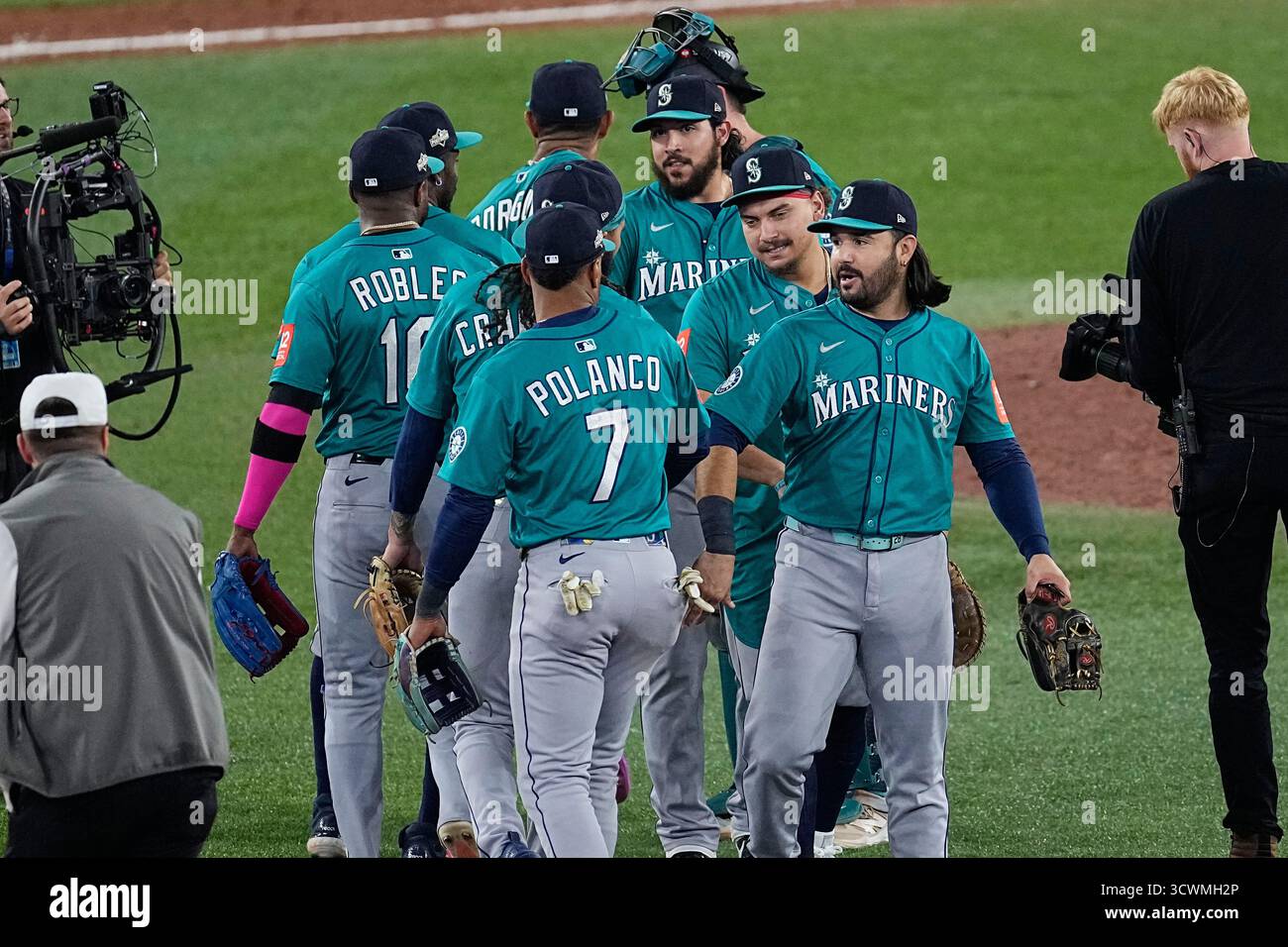 The Seattle Mariners celebrate after Game 1 of baseball's American ...