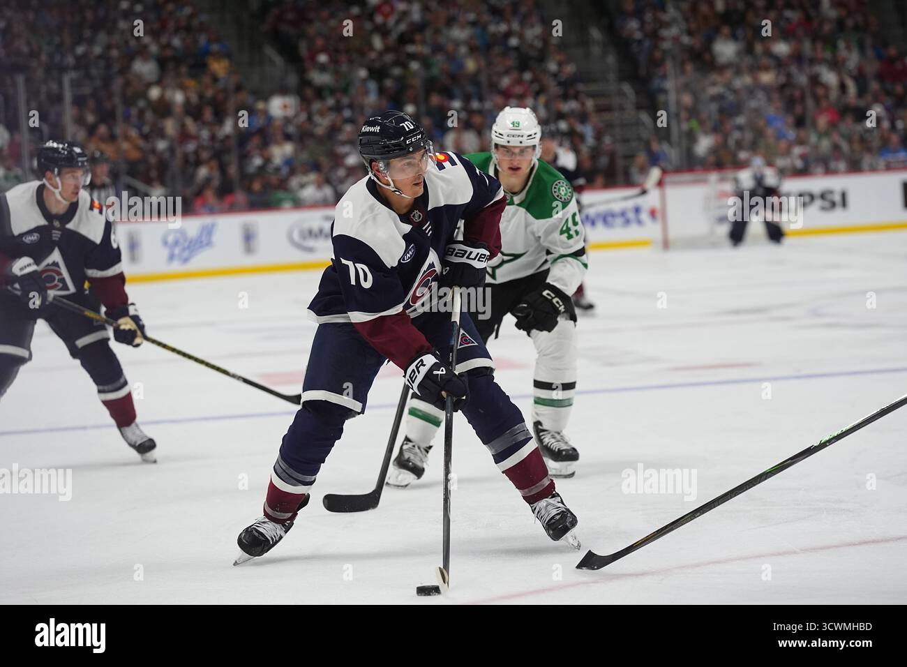 Colorado Avalanche defenseman Sam Malinski (70) is pursued by Dallas ...