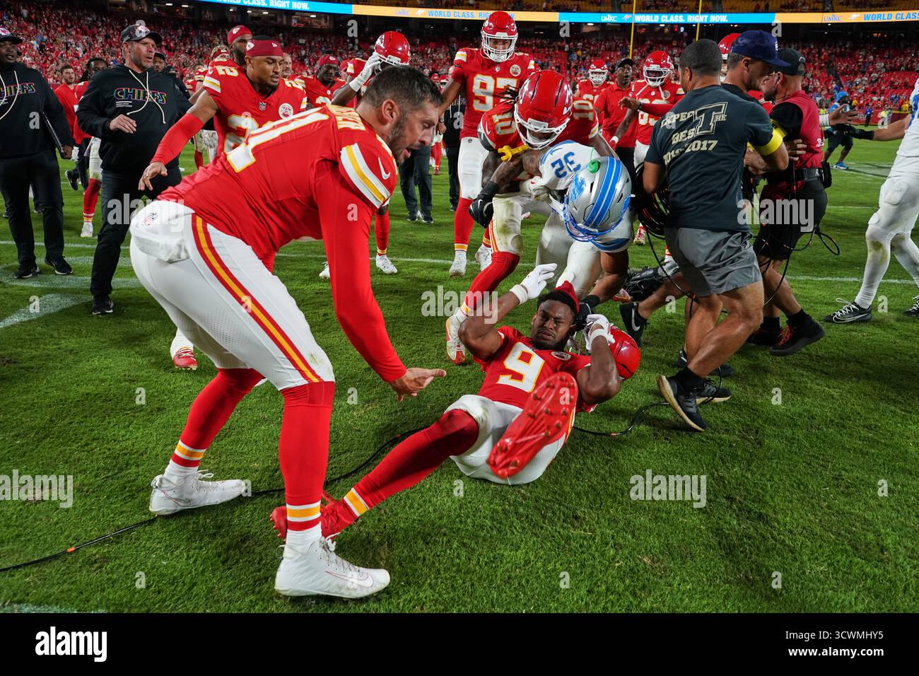 Detroit Lions defensive back Brian Branch (32) fights with Kansas City ...
