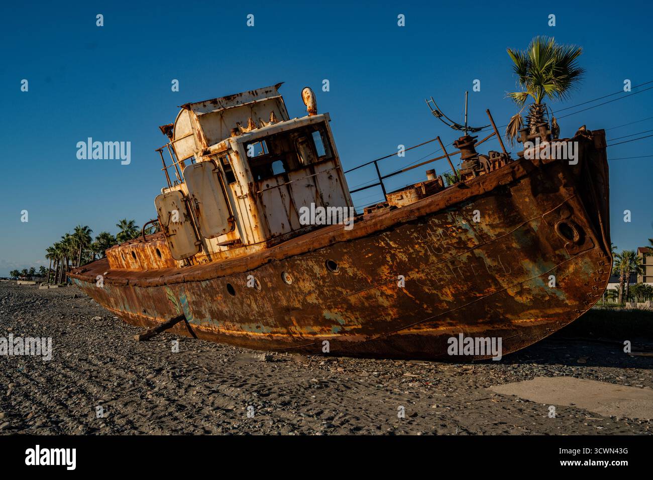 Rusty Abandoned Ship On The Beach In Anaklia Georgia: Old Metal Vessel ...