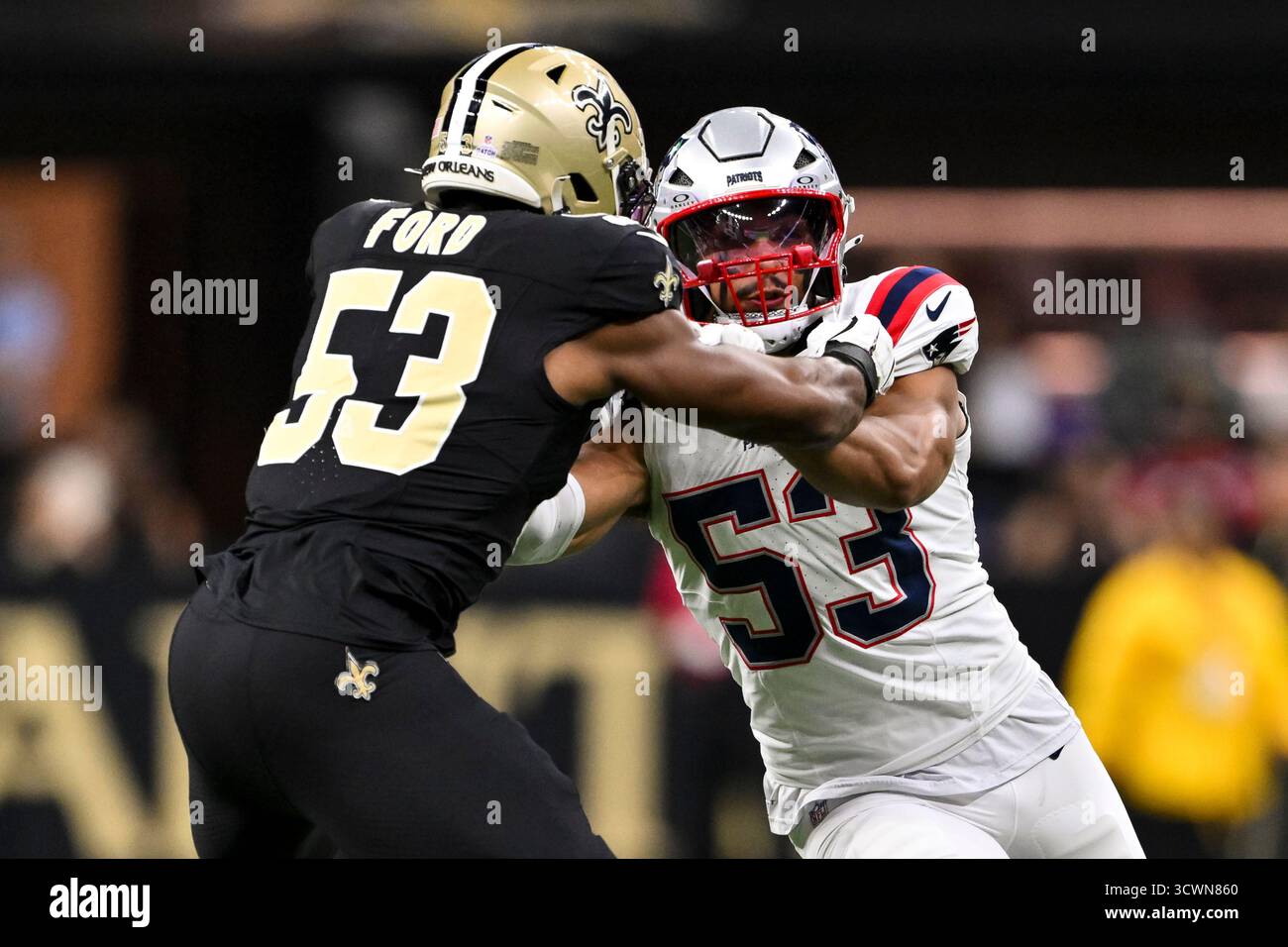 New England Patriots linebacker Christian Elliss (53) defends in ...