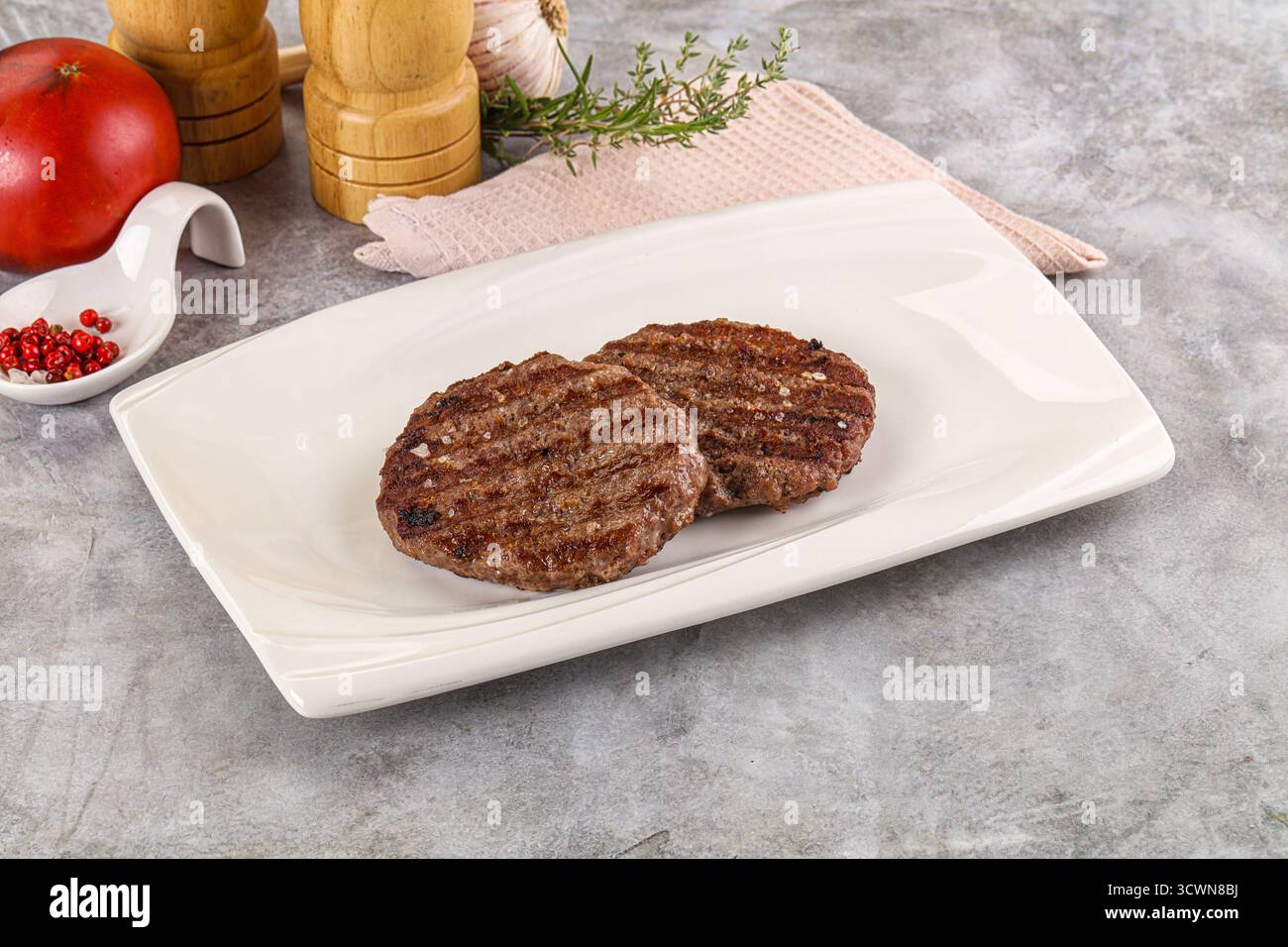 Grilled beef round burger cutlet minced meat Stock Photo - Alamy