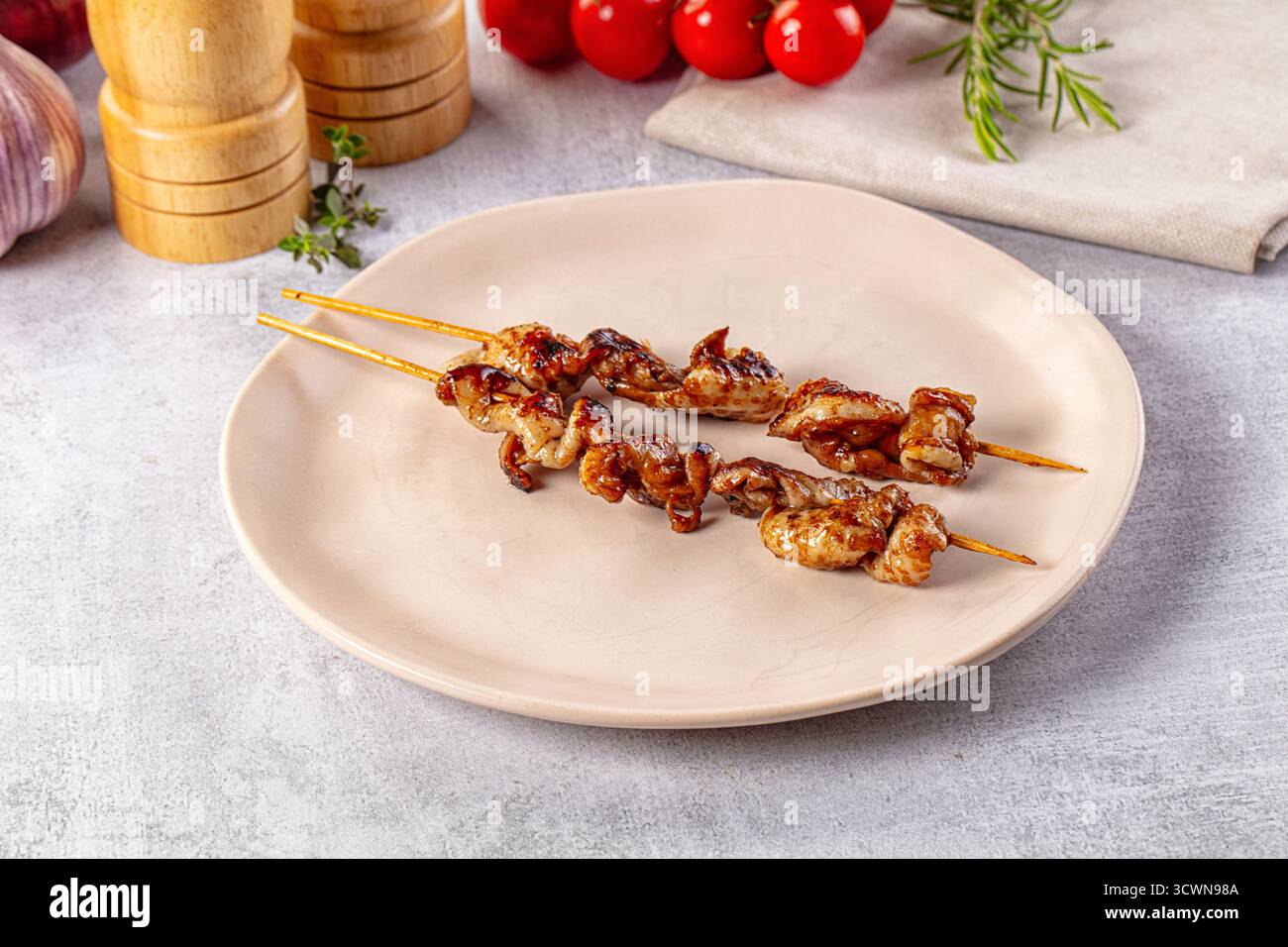 Yakitori - grilled chicken skin skewer snack Stock Photo - Alamy