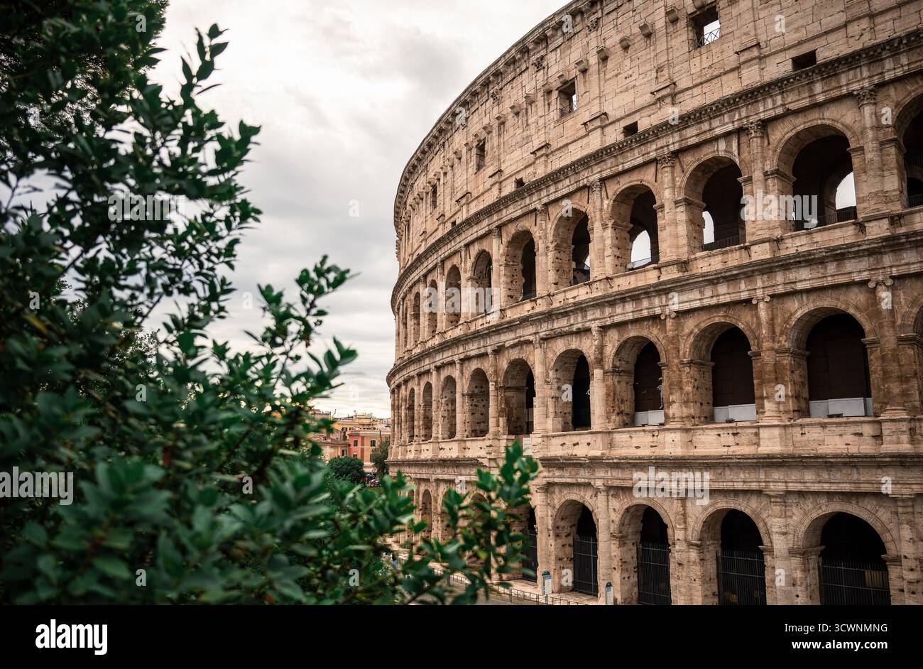 Ancient Roman Colosseum with arches and stone architecture in Rome ...