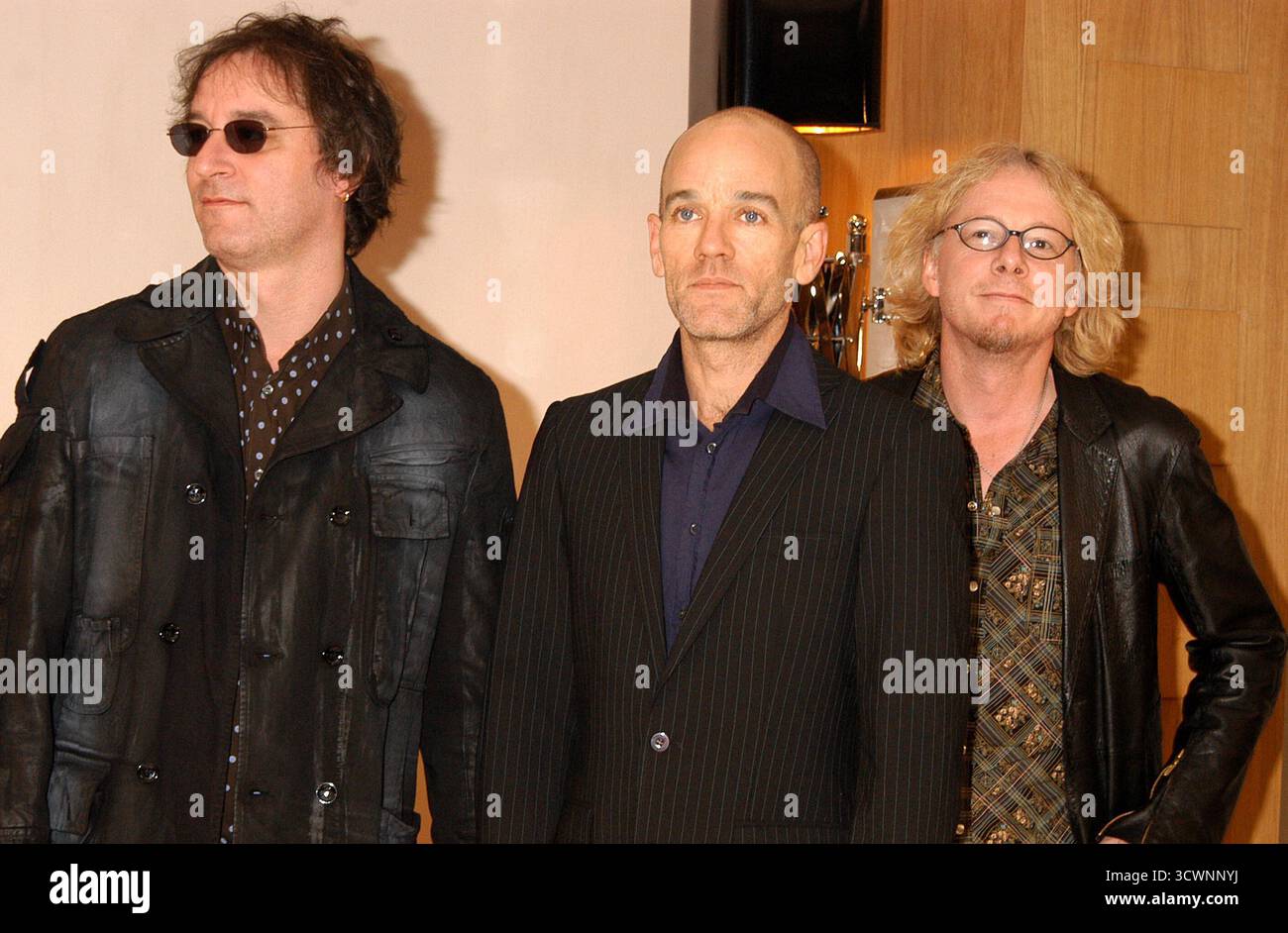 Michael Stipe, Peter Buck and Mike Mills from R.E.M. at a photocall to ...