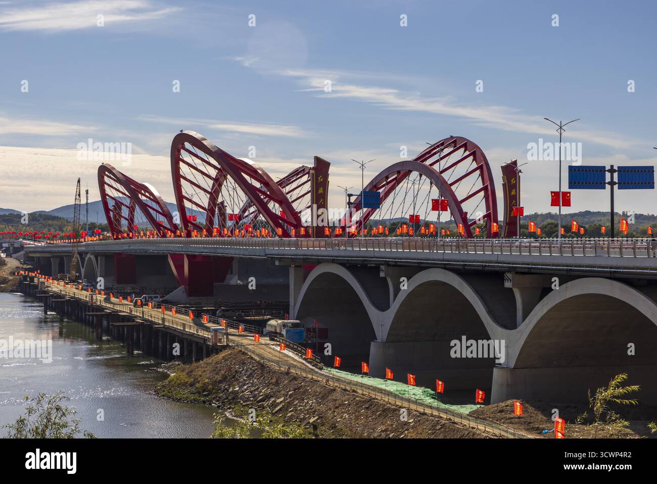 Aerial photo shows the Hongqi Bridge over the Songhua River in Jilin ...