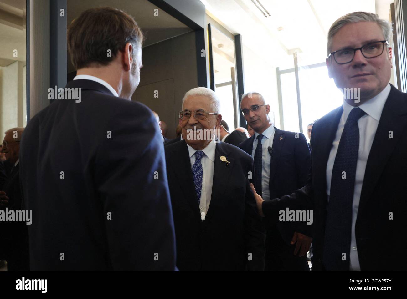 (left to right) President of France Emmanuel Macron, Palestinian ...