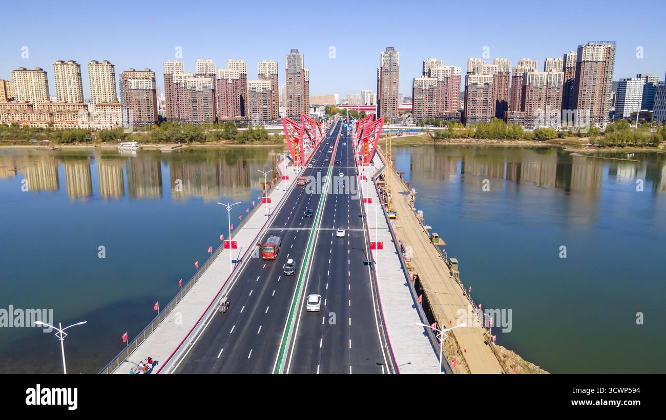 Aerial photo shows the Hongqi Bridge over the Songhua River in Jilin ...