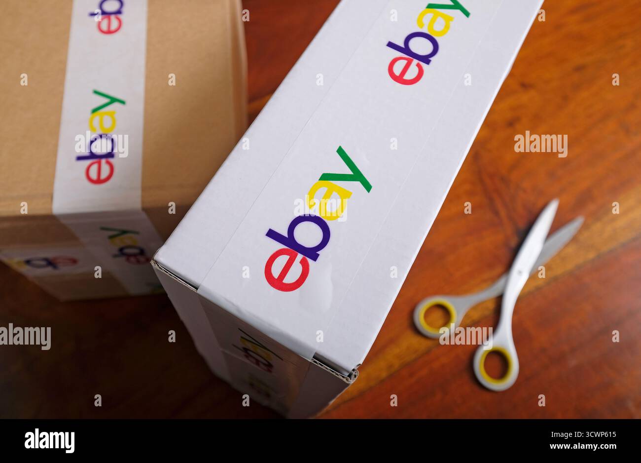 ebay delivery parcels on table top in home interior Stock Photo - Alamy