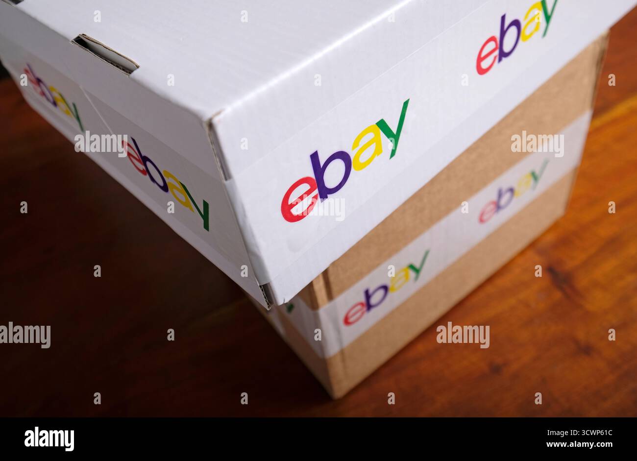 ebay delivery parcels on table top in home interior Stock Photo - Alamy
