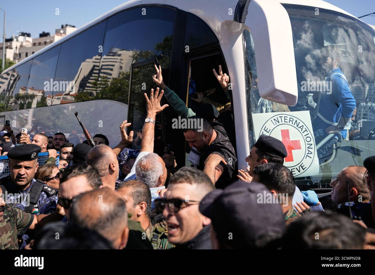 Palestinian prisoner make the victory sign after being released from an ...