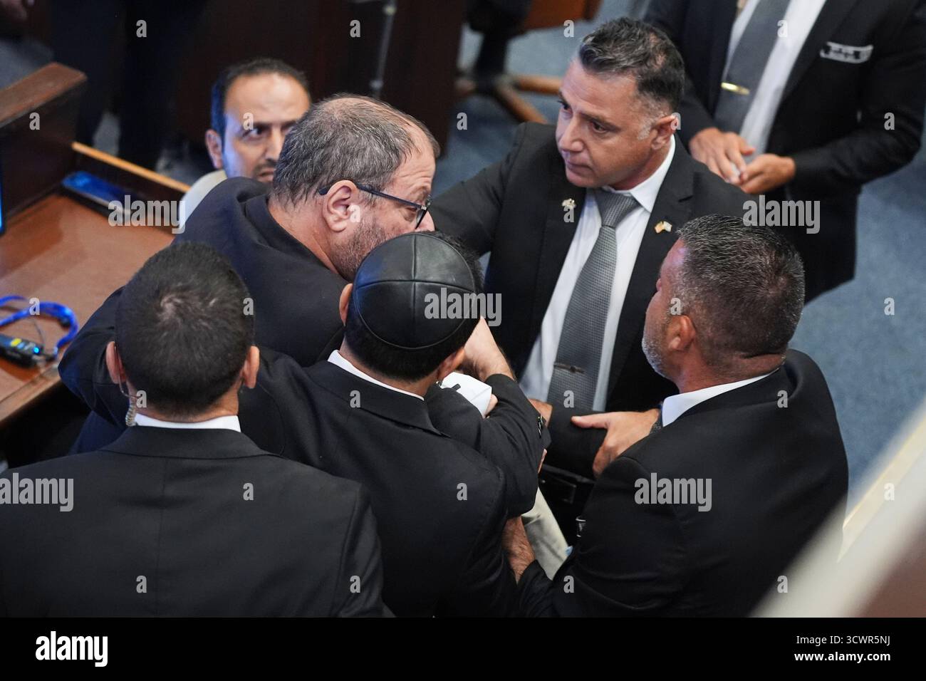 Security officials remove a Knesset member who interrupted President ...