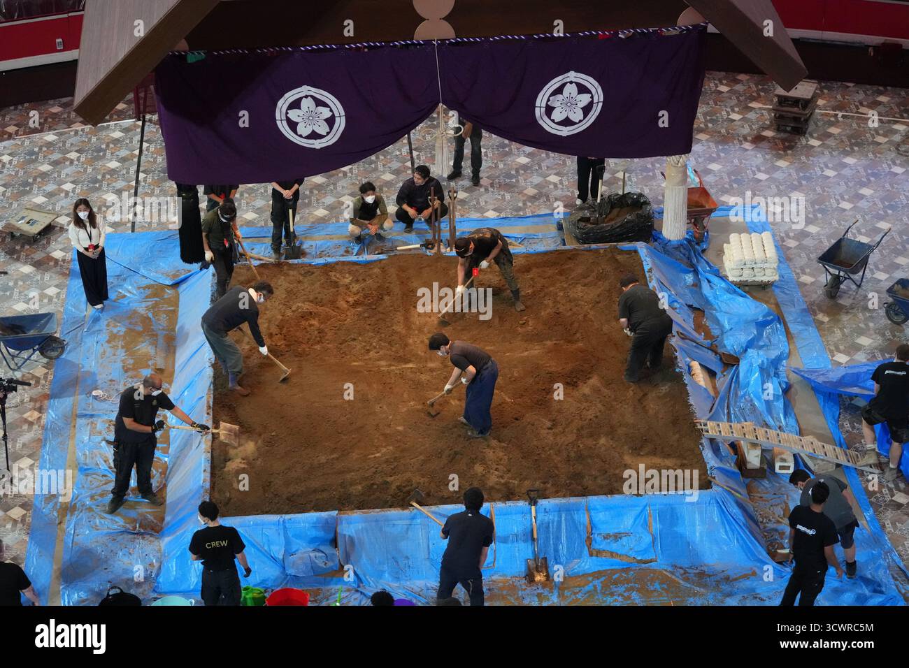 Workers build up the dohyo, the sacred sumo wrestling ring and the ...