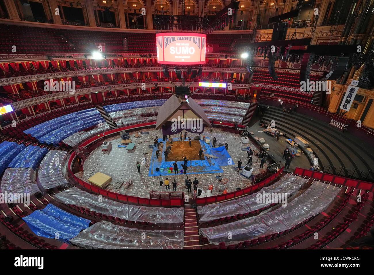 Workers build up the dohyo, the sacred sumo wrestling ring and the ...