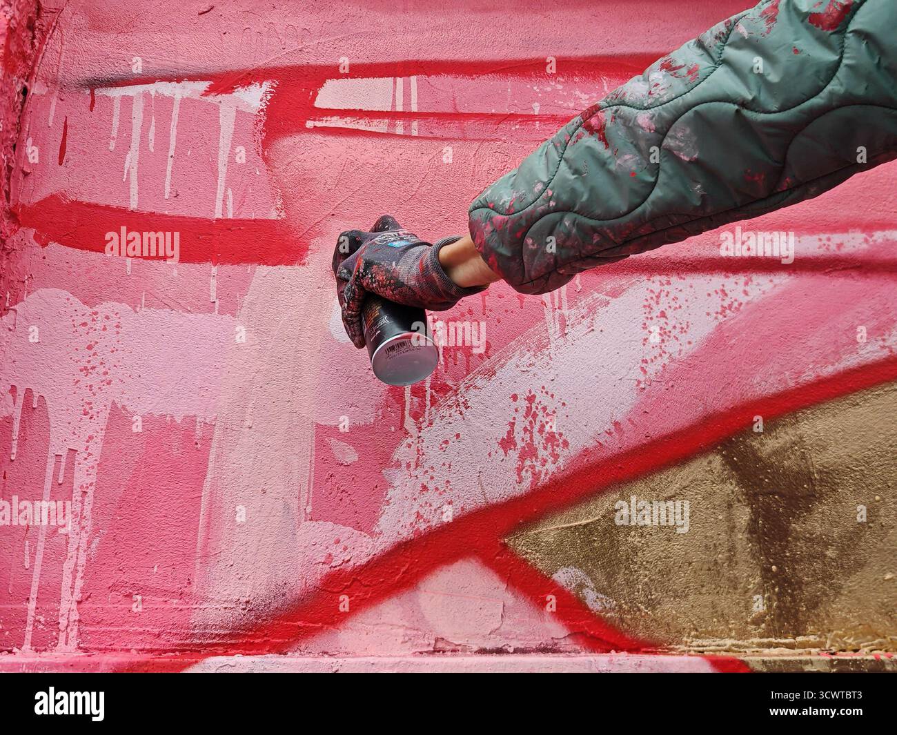 spraying color with an aerosol can or a spray can spraying color with ...