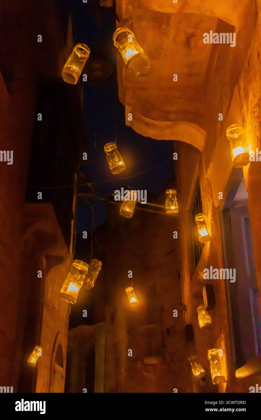 Warm Amber Jar Lanterns Dangling Over Narrow Night Alley Creating Cozy ...