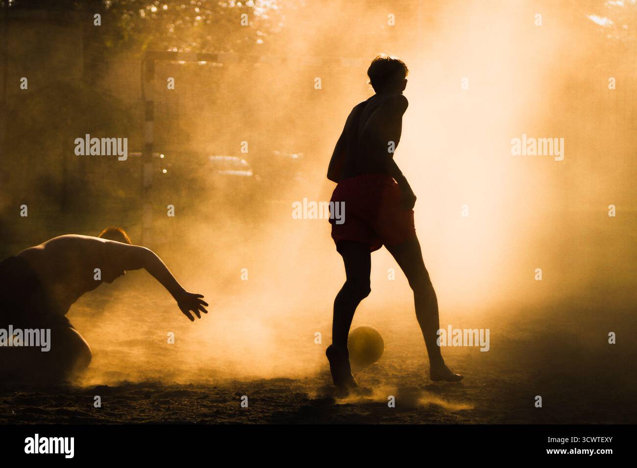 Sellye, Hungary - 30 June 2023: View of silhouetted figures playing ...