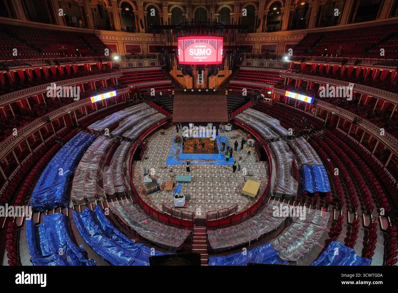 Workers build up the dohyo, the sacred sumo wrestling ring and the ...