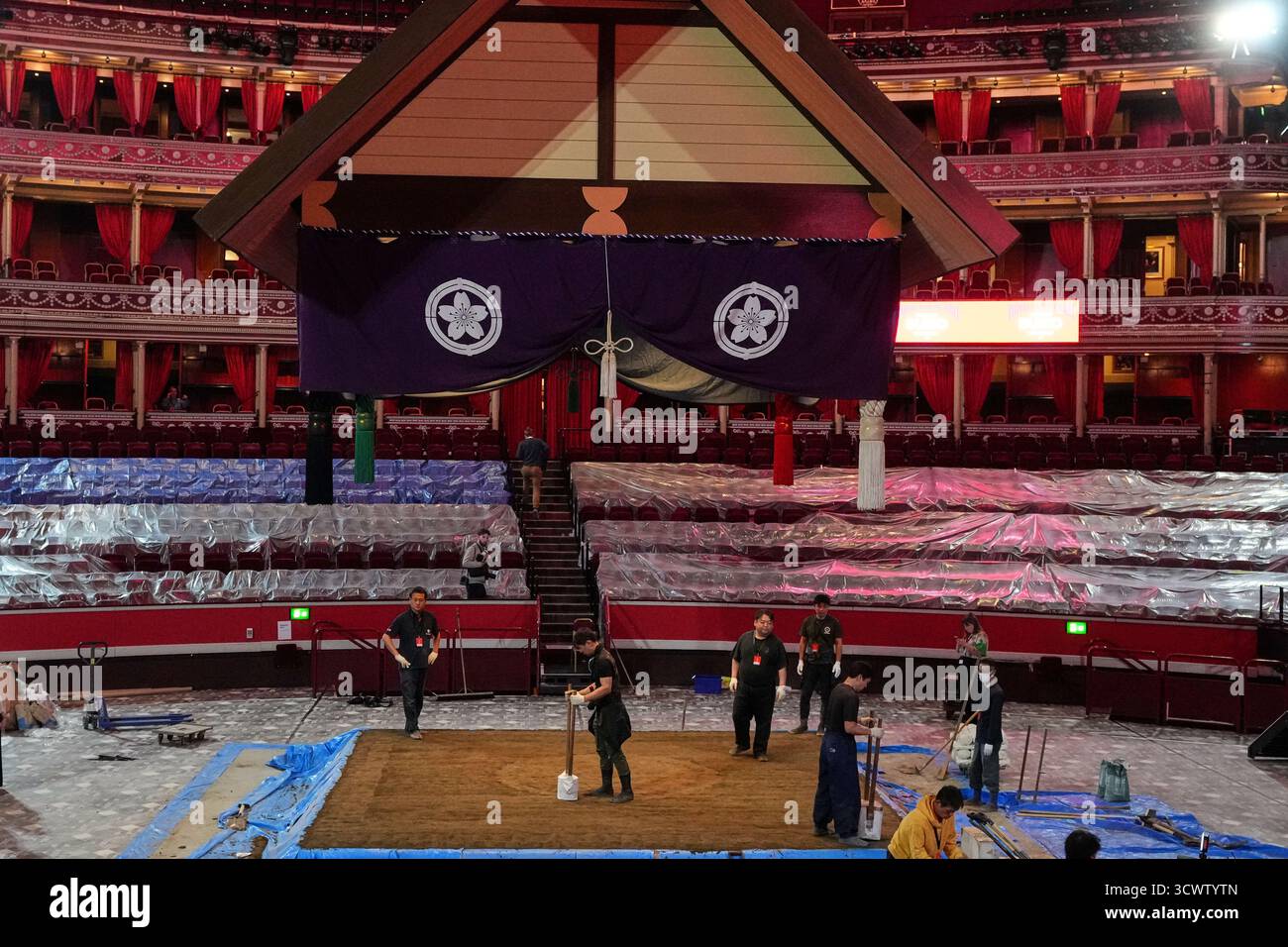 Workers build up the dohyo, the sacred sumo wrestling ring and the ...