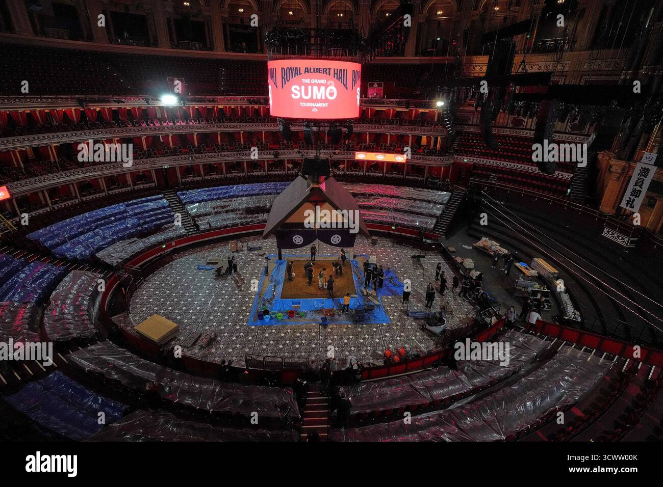 Workers build up the dohyo, the sacred sumo wrestling ring and the ...