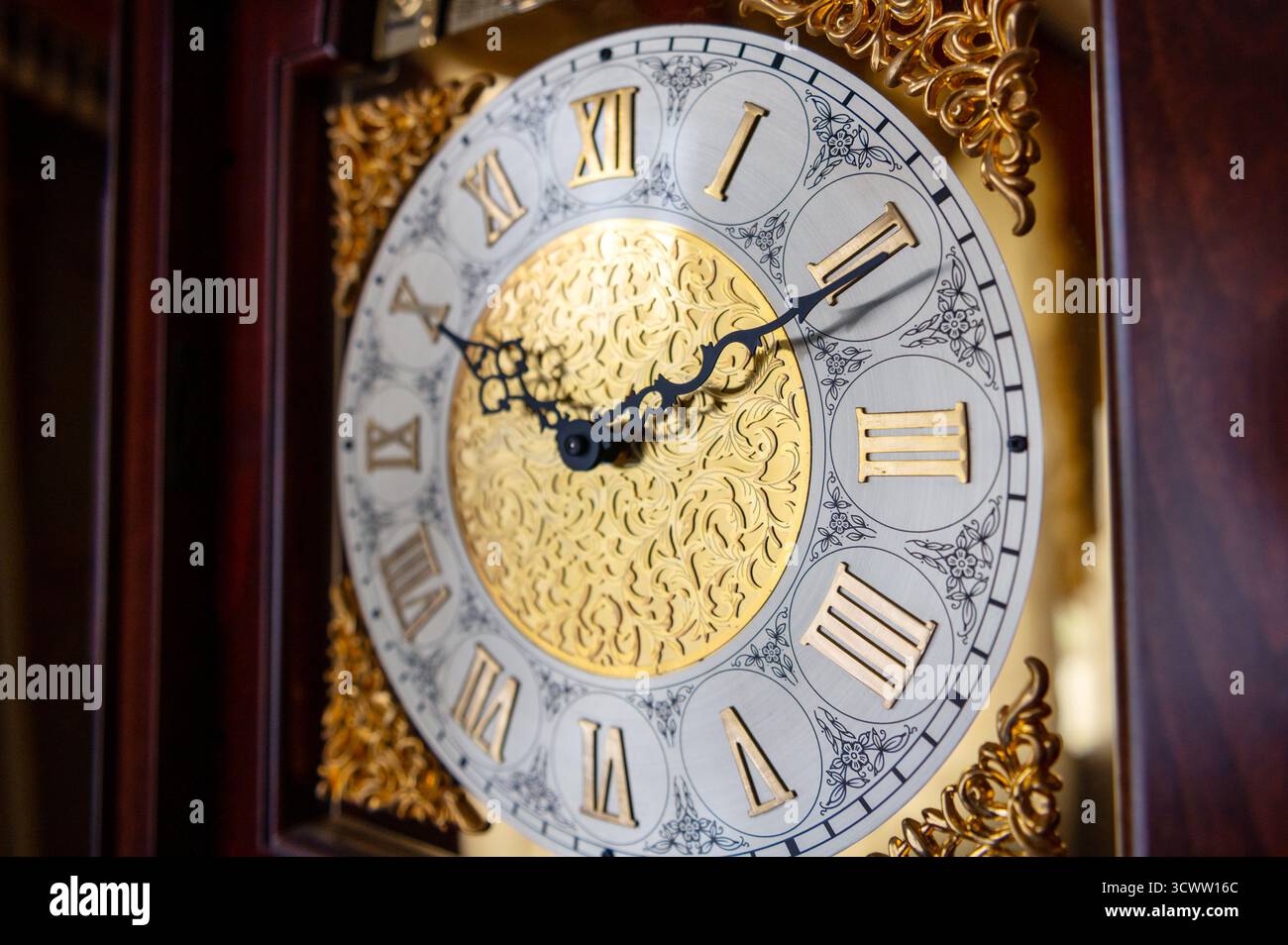 Dial of a vintage grandfather clock. Antique grandfather clock face ...