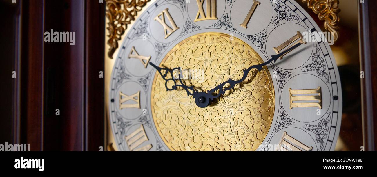 Dial of a vintage grandfather clock. Antique grandfather clock face ...
