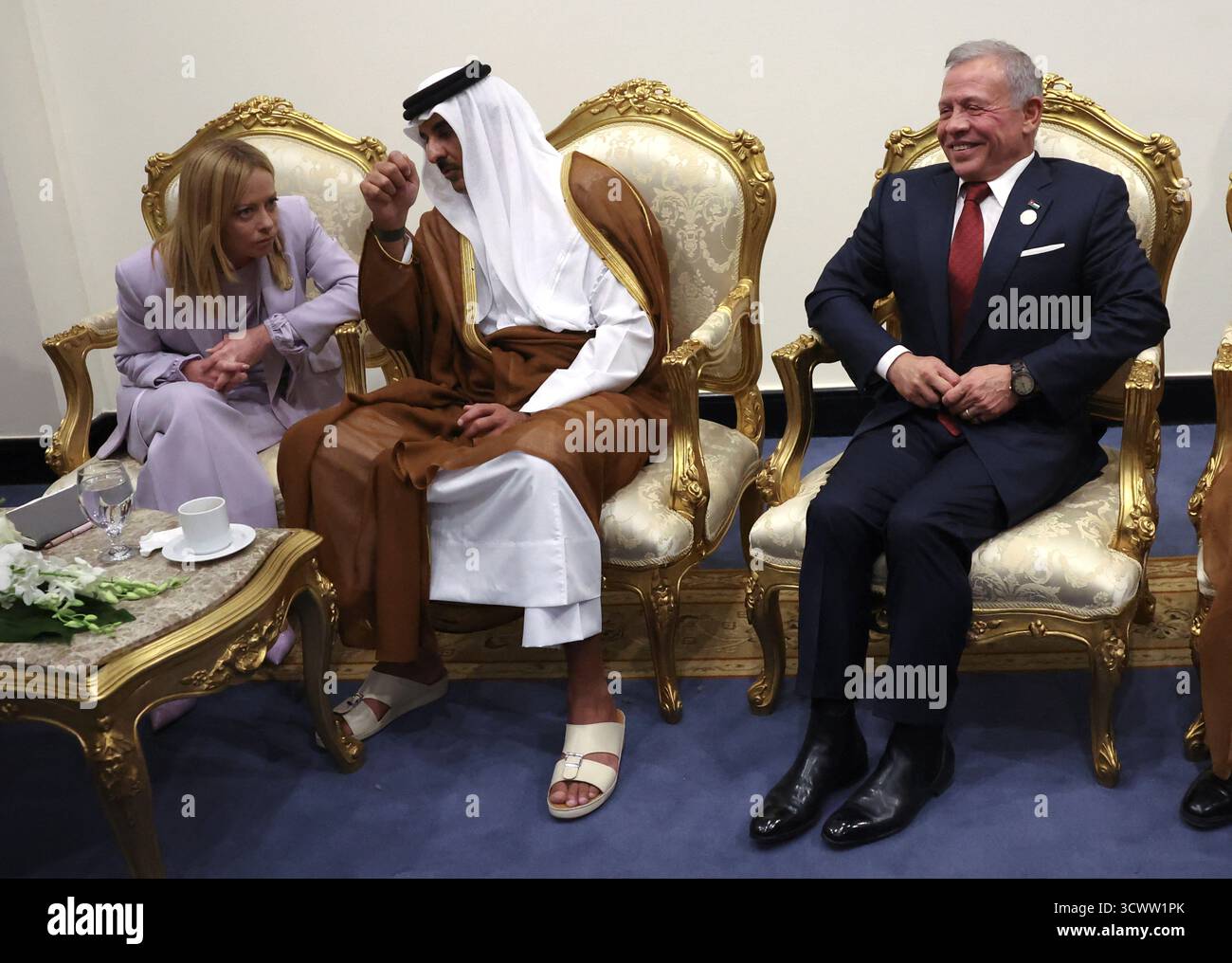 (left to right) Italy's Prime Minister Giorgia Meloni, Emir of Qatar Sheikh Tamim ibn Hamad Al ...