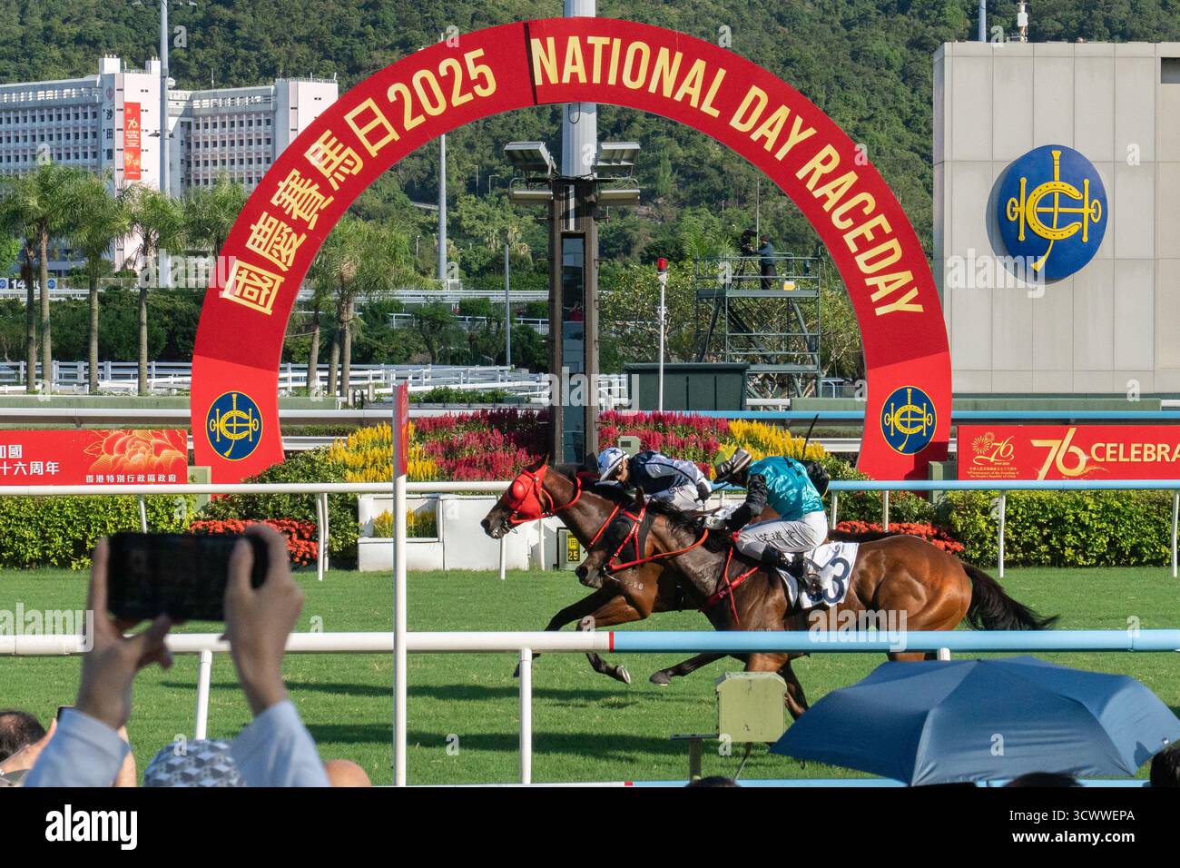 Horses racing at Shatin Racecourse on the China National Day Raceday on ...