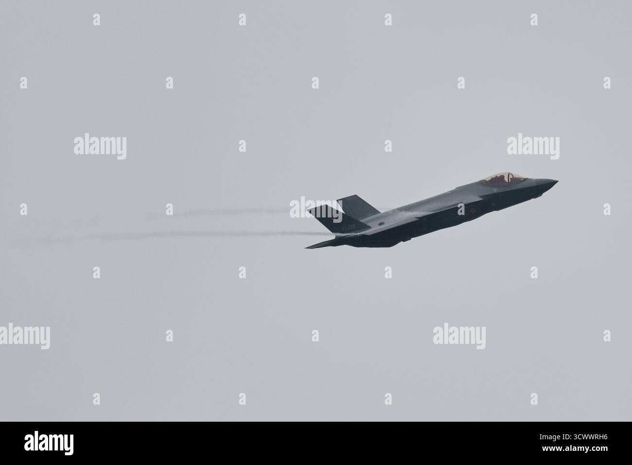 An F-35A Lightning II flys by on the occassion of the first F-35 ...
