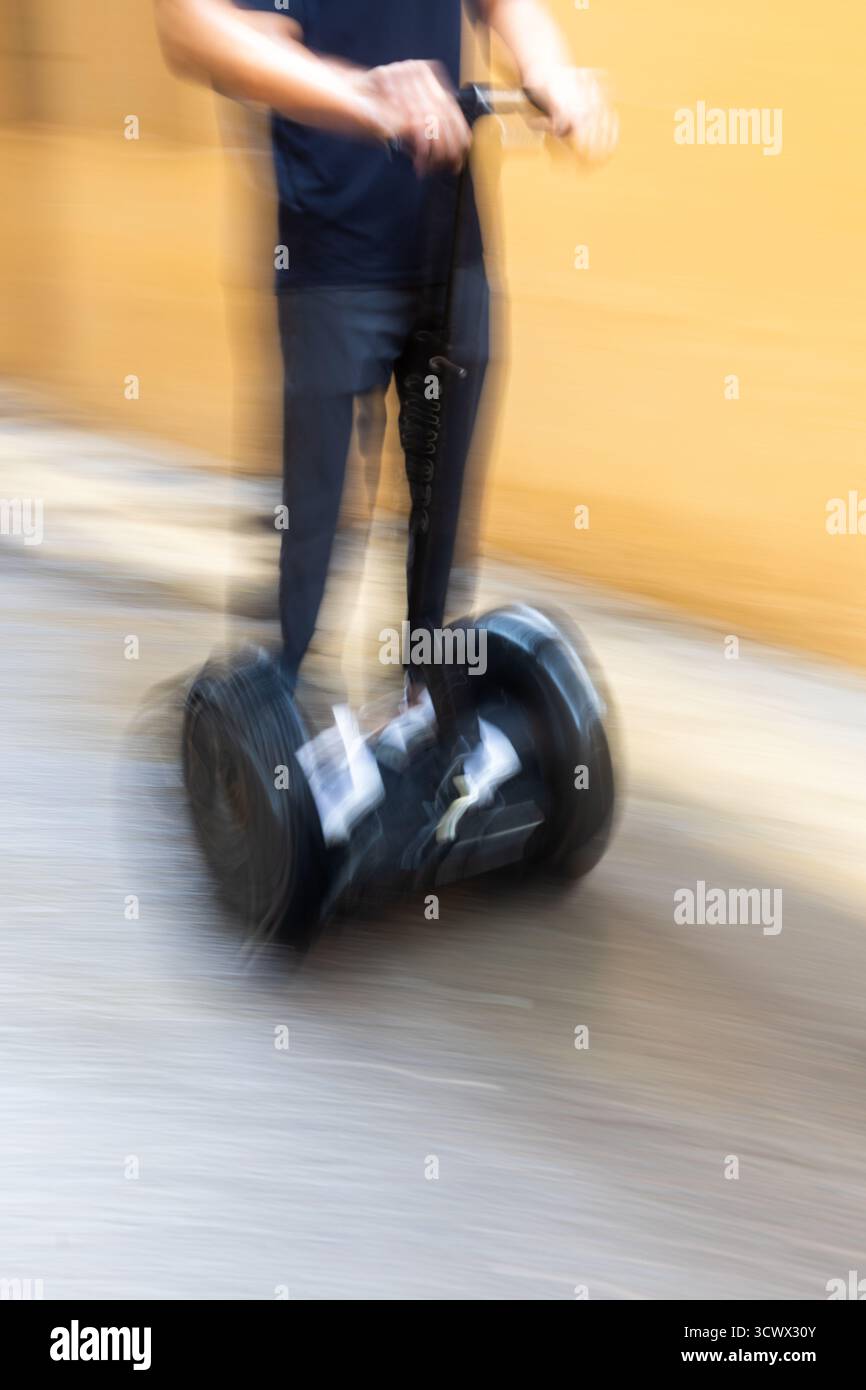 A person on a Segway scooter Stock Photo - Alamy