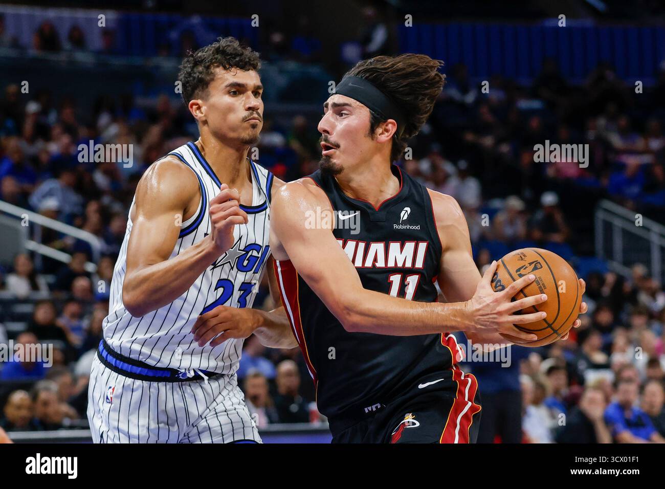 Orlando Magic forward Tristan da Silva (23) defends Miami Heat guard ...