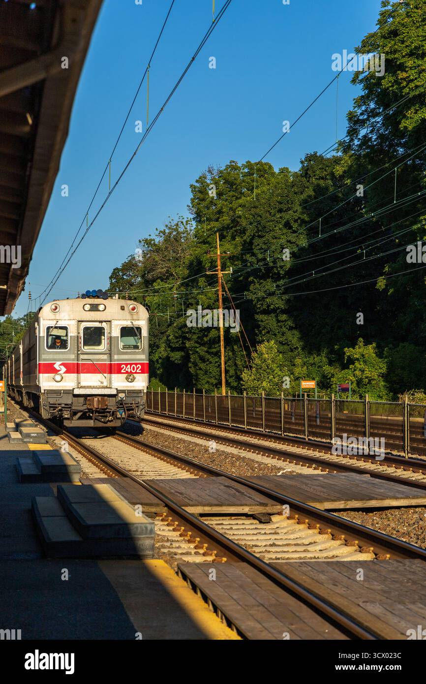 A Septa train is on the tracks at a train station, Philadelphia, USA ...